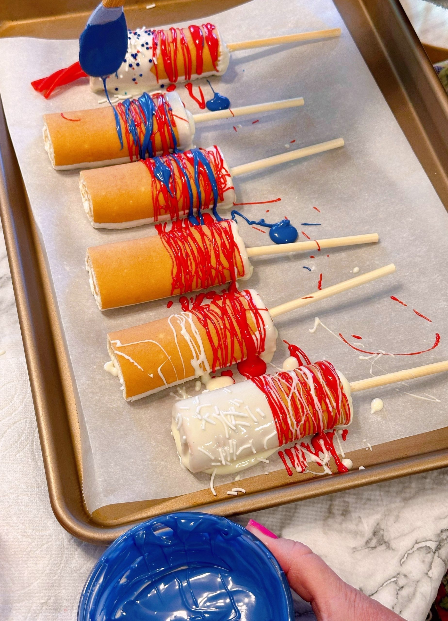 Firecracker Swiss Roll Cake Pops | Norine's Nest